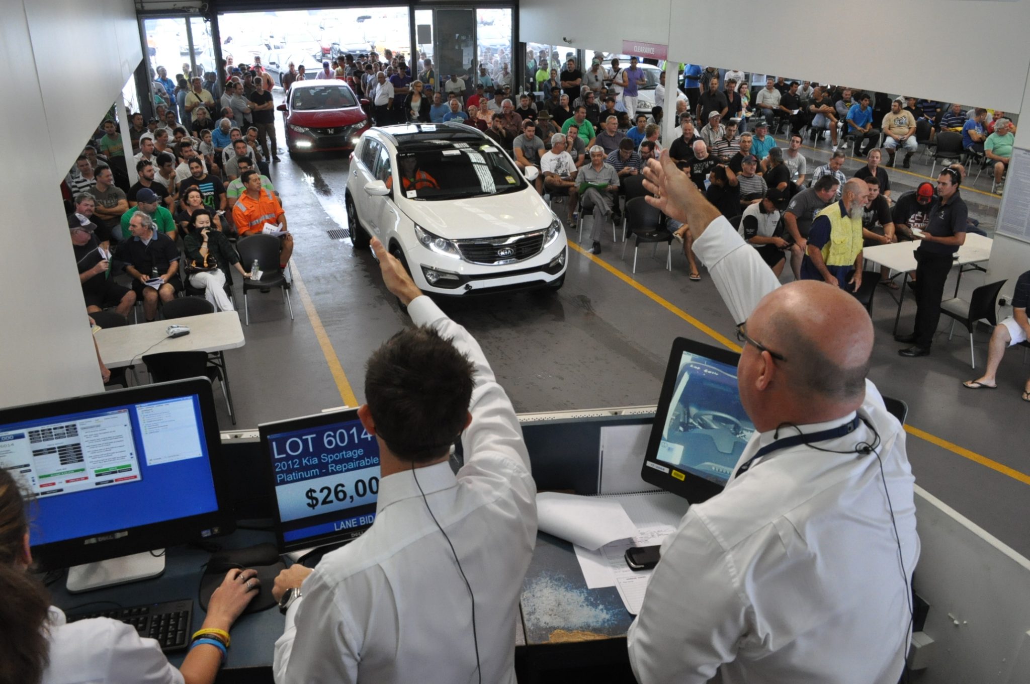 Reasons to attend a used vehicle auction in-person - Cox Automotive